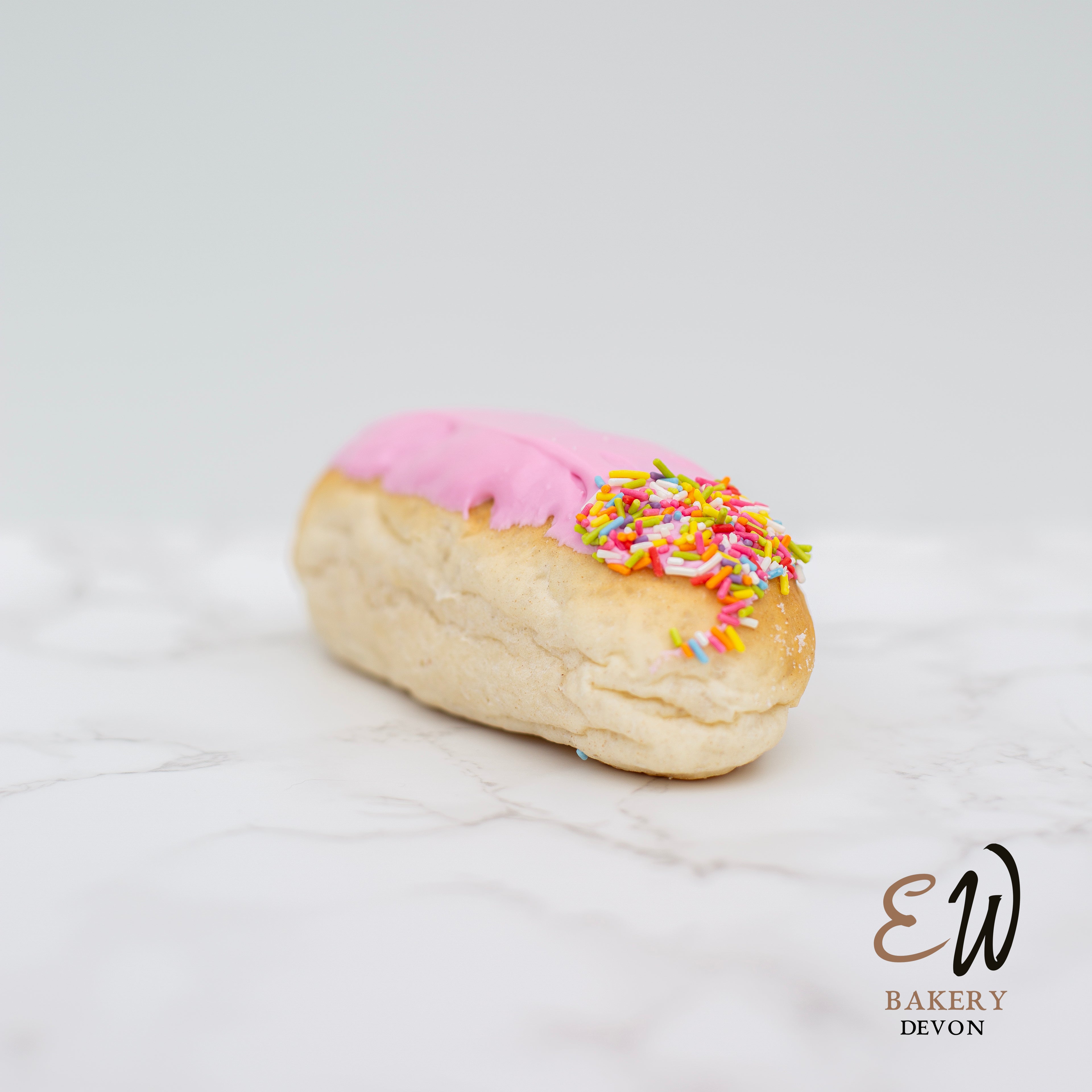 Iced Finger Bun – East and West Bakery